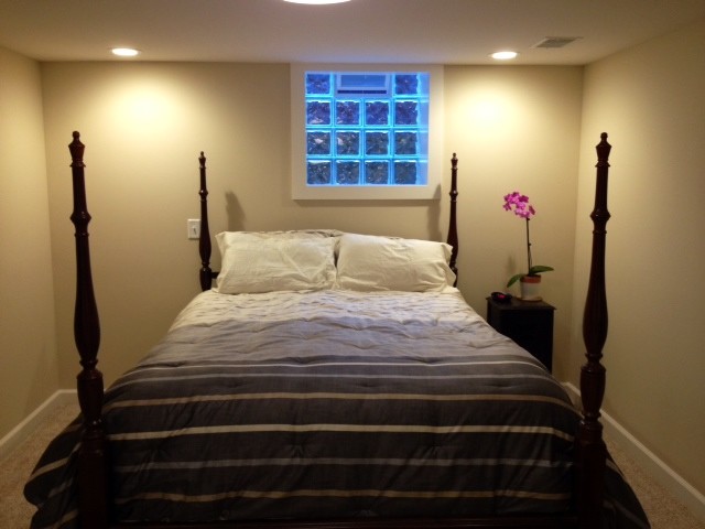 How do I add balance to a wall with an off-center window?