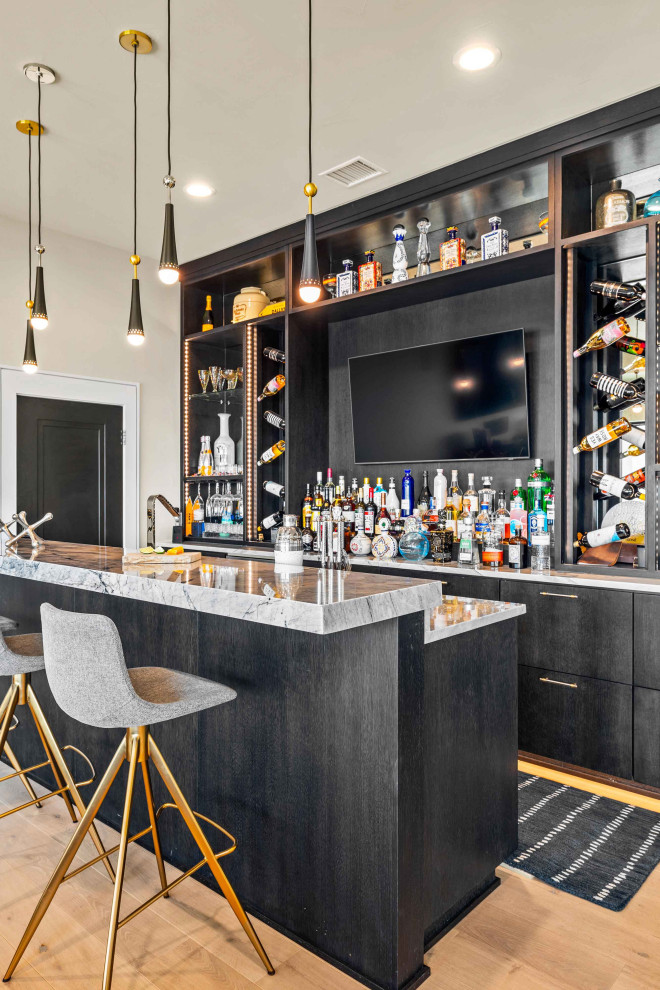 Home Bar with Marble Countertop and Dark Cabinetry - Mediterranean ...