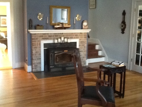 Living room with too many doors and windows