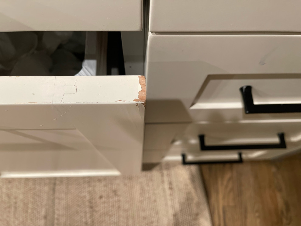 How does one repair these small cabinet blemishes?