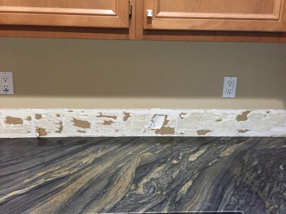 Backsplash recommendations for black fantasy leathered granite?