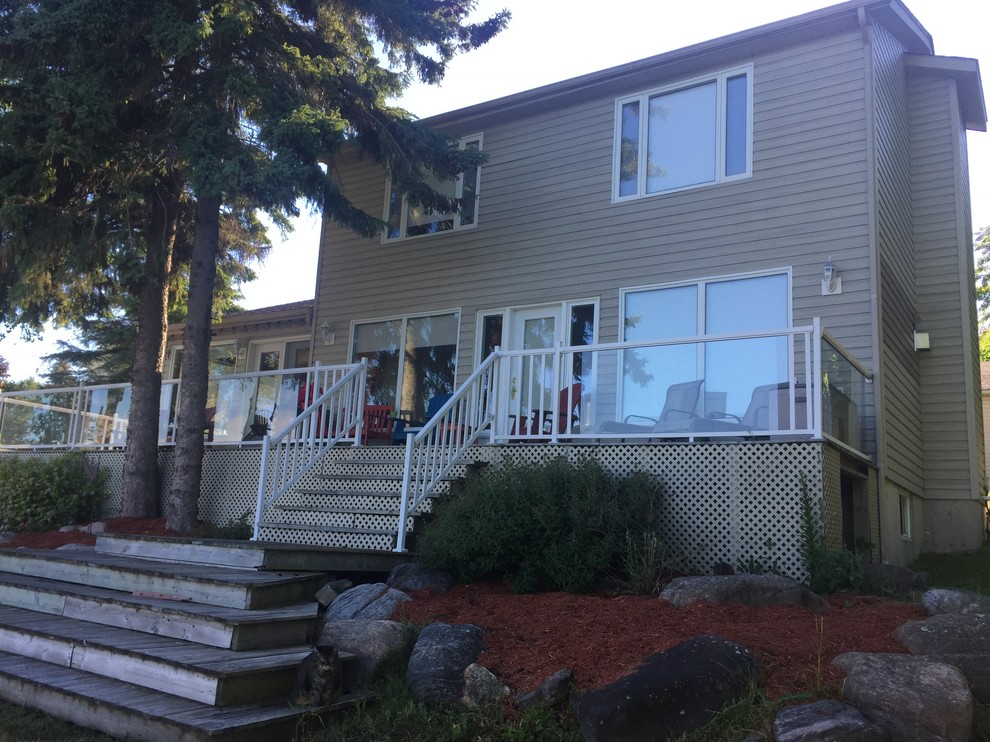 Fix a boring facade with new siding, windows, soffit, trim etc