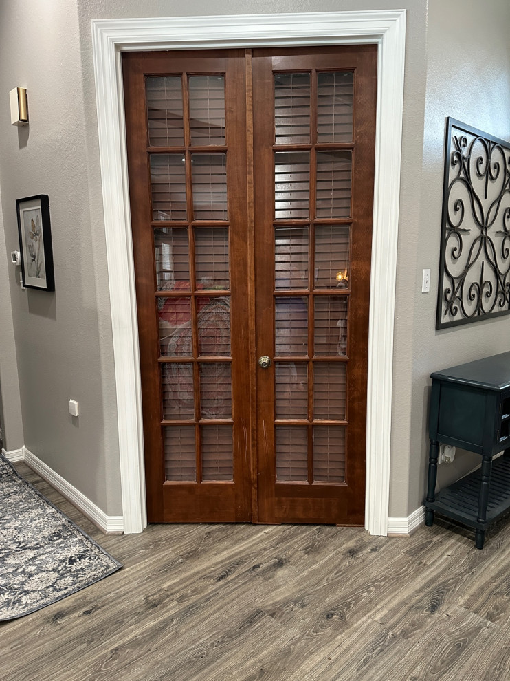 Paint it white? traditional dark wood study and grayish flooring