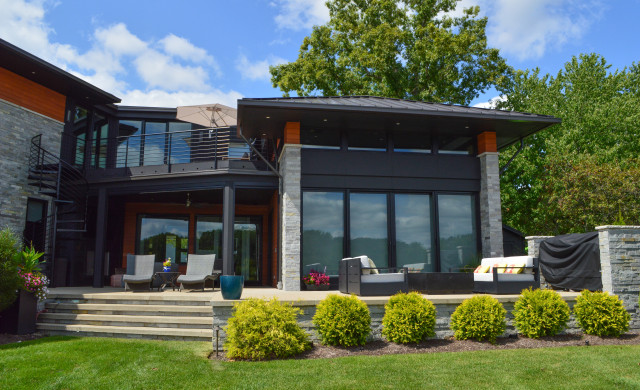 Contemporary Lake House Exterior - view of back side facing the lake ...