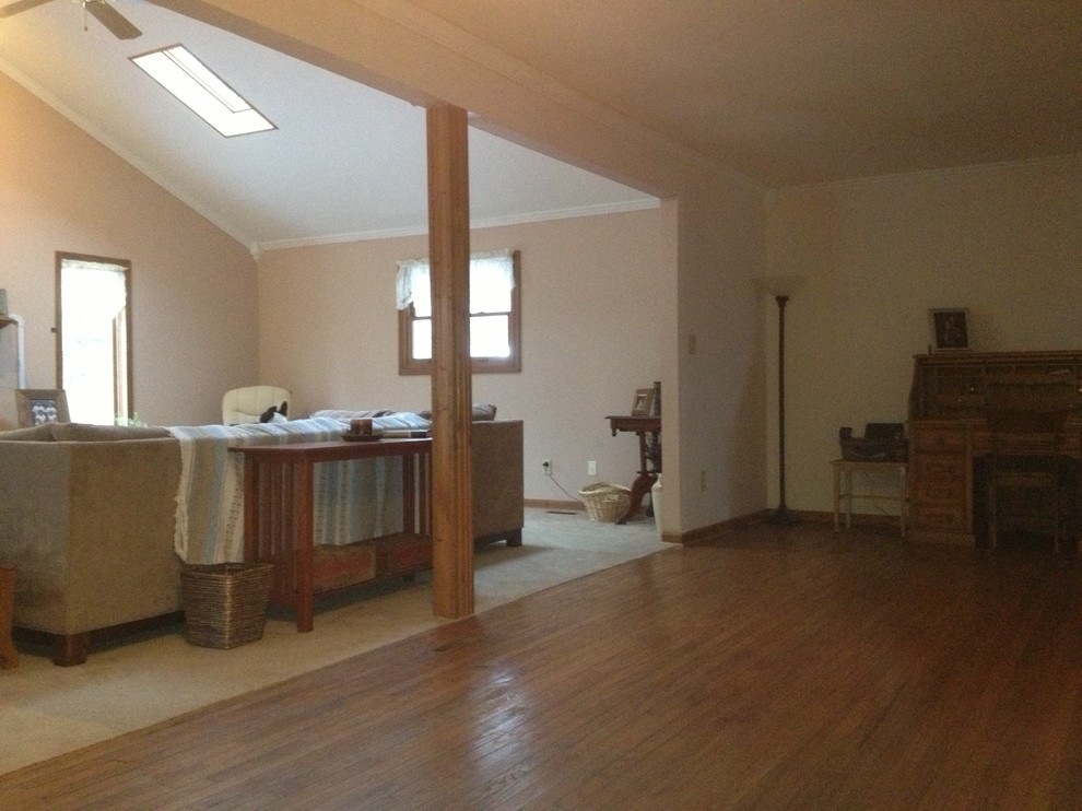 Stained baseboards with white crown molding, possibly add wainscoting?