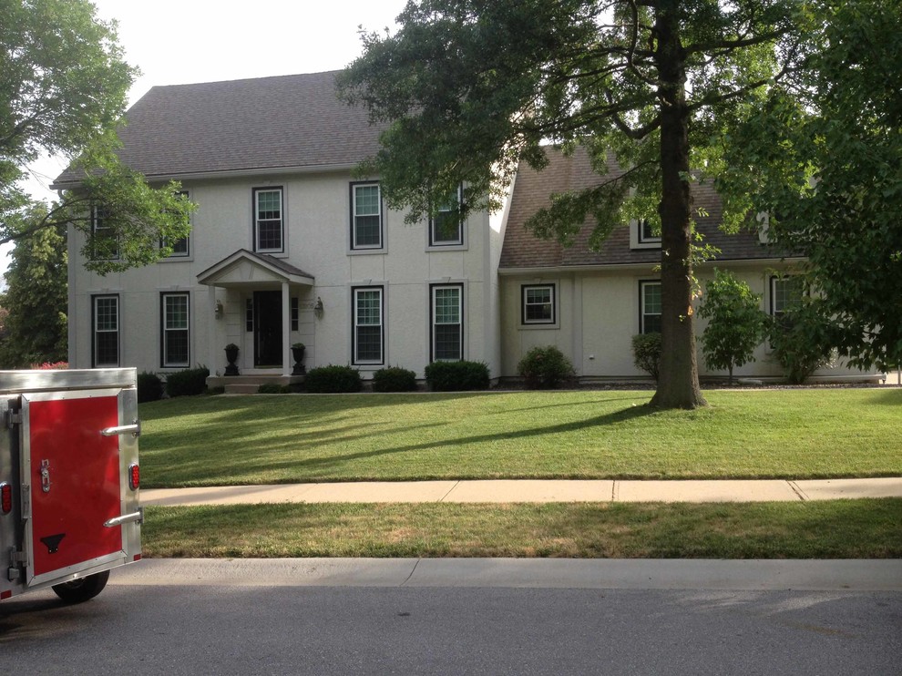 Traditional Colonial with Stucco? How do we make this look amazing?