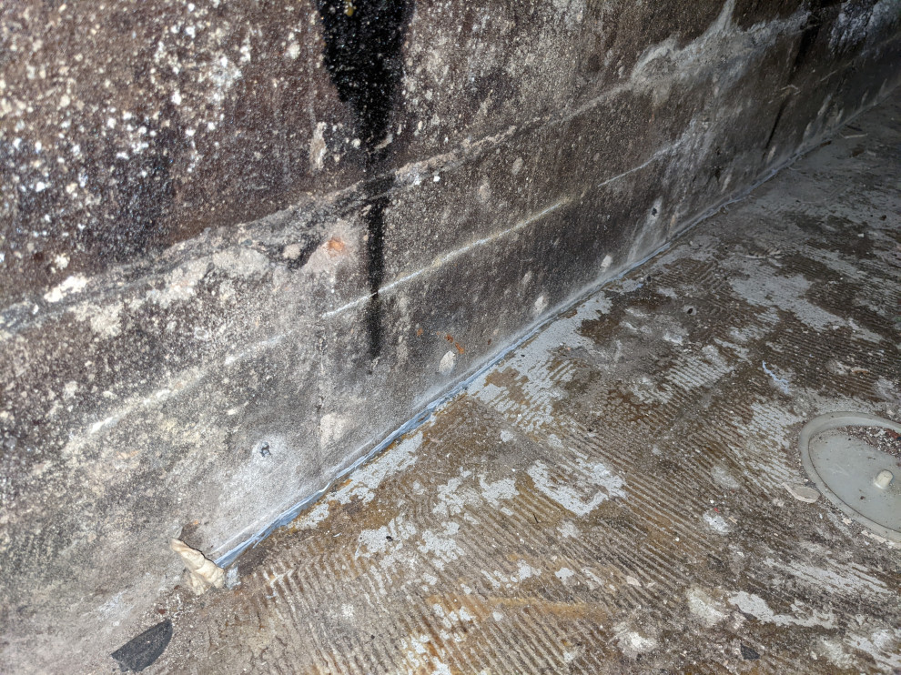 Contractor removed dimple drain waterproofing system