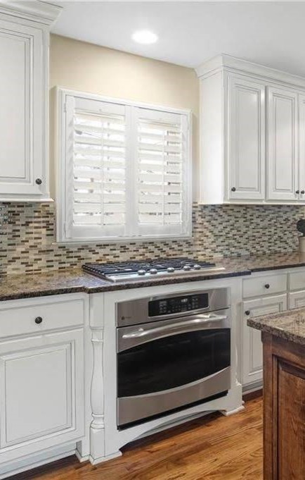 Range hood ideas for small area between window and ceiling