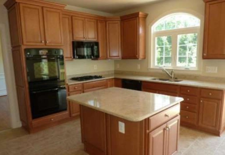 Contemporary girl stuck in a traditional kitchen