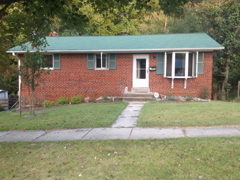 Green roof on a brick ranch -- gutter and trim advice, please!