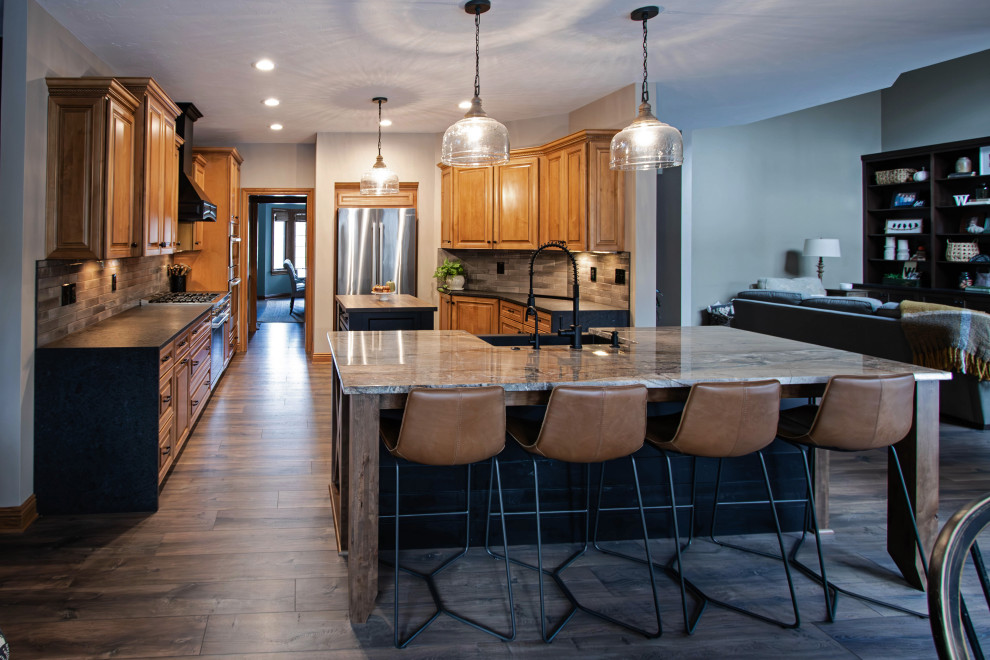 Reconfigured kitchen with new islands, countertops, backsplash ...
