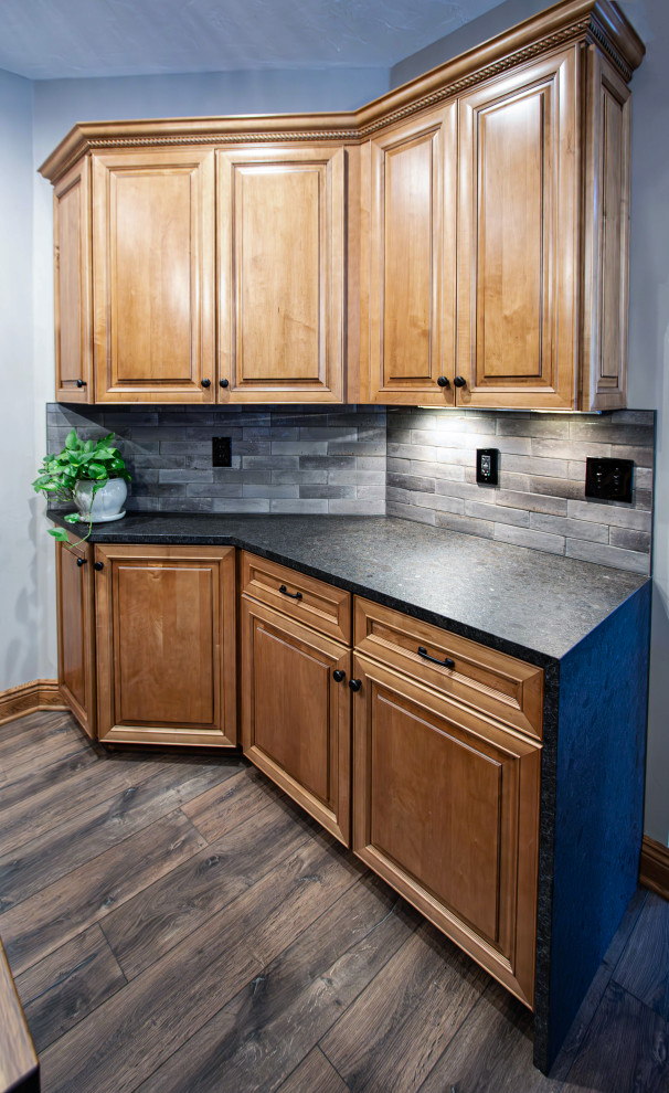 Reconfigured kitchen with new islands, countertops, backsplash ...