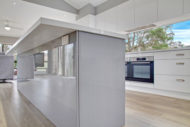 Clean and neutral colour combination for cabinets and stone benchtop ...