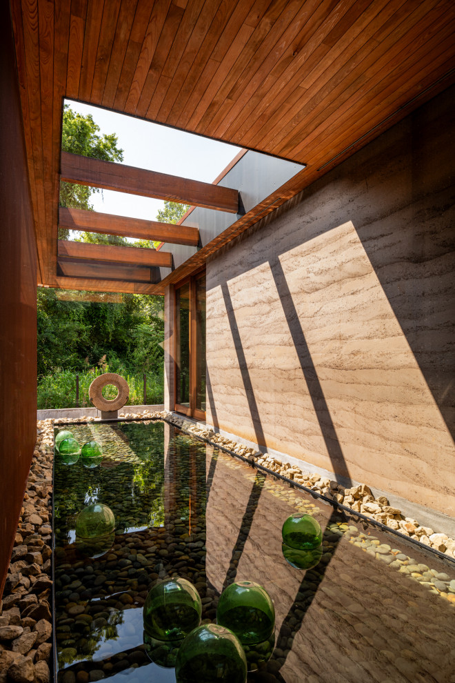 Rammed earth walls - Modern - House Exterior - Other - by PureBuild Inc ...