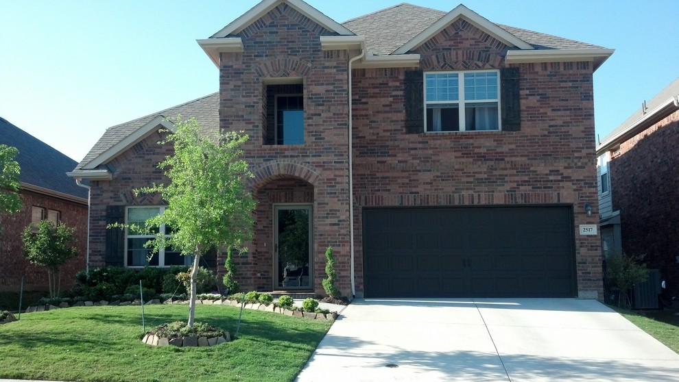Big boring brick block of a home needs life