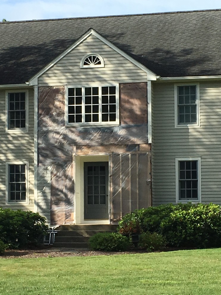 Portico design for a traditional colonial, with recessed door