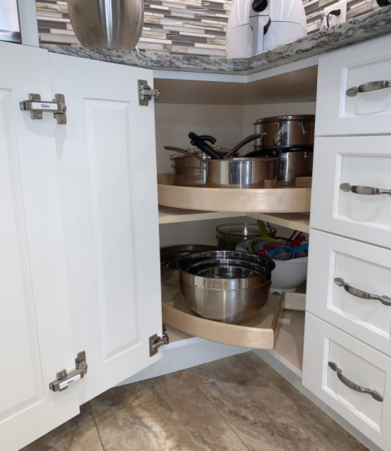Super-sized lazy Susan corner cabinets with bi-folding doors ...
