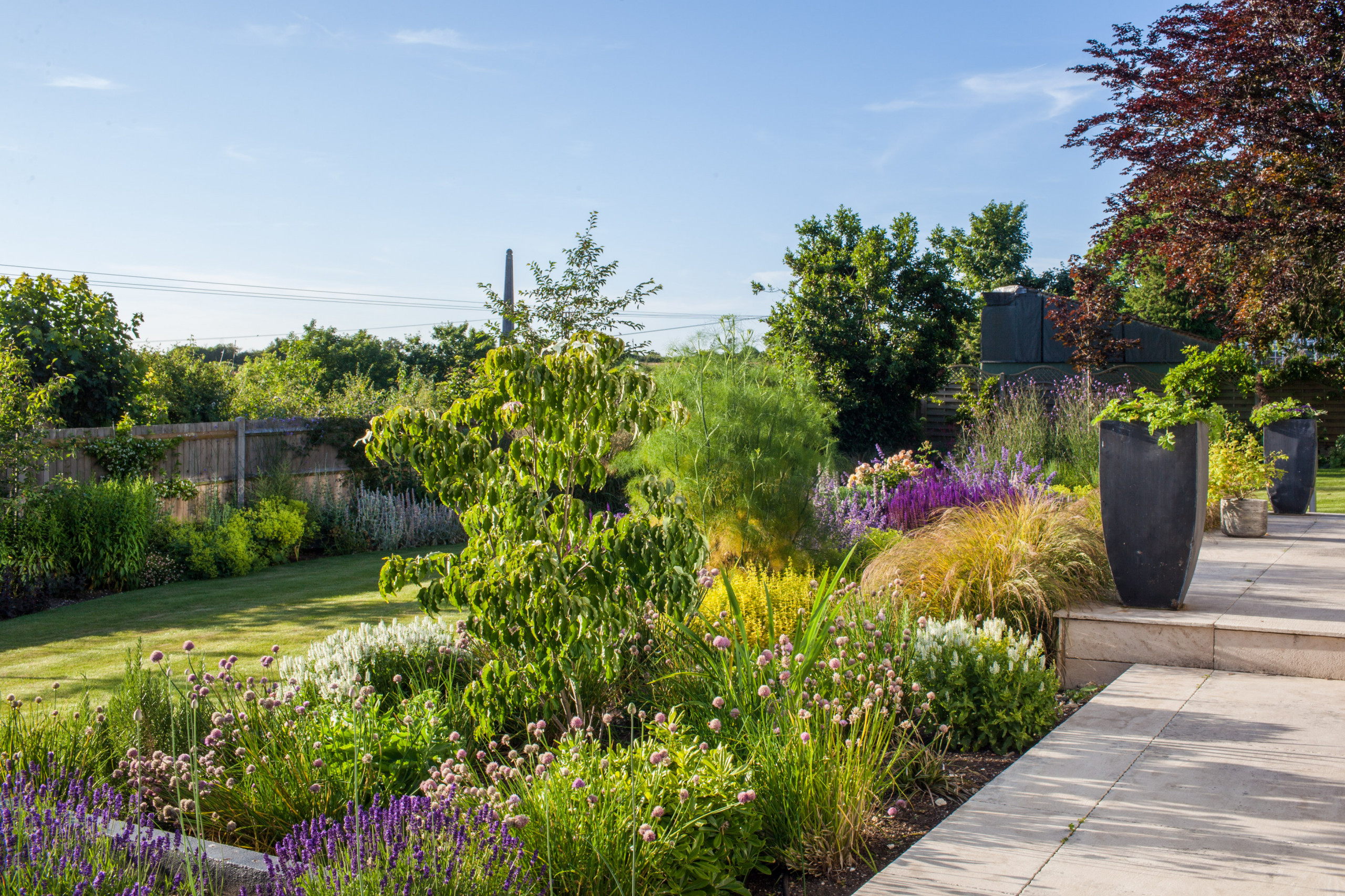 Garden Tour: A Shallow Plot Gains Depth and an Entertaining Space ...