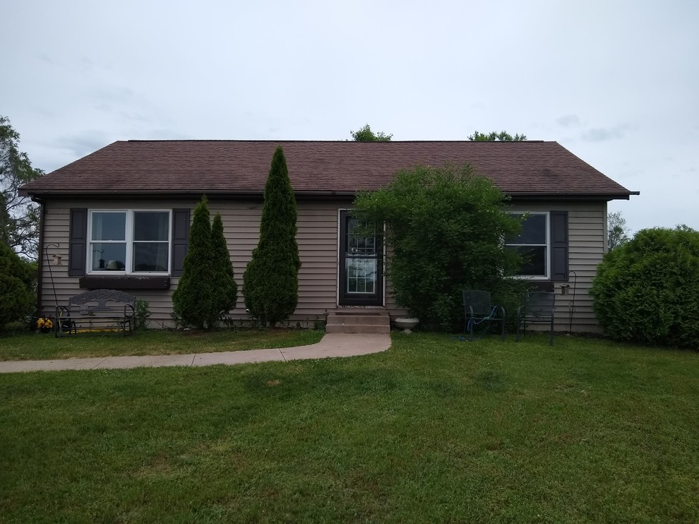 Adding front porch and 26' addition to small ranch house.