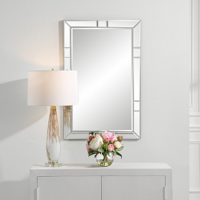 Beveled mirror panels are complemented with a .5" beveled center mirror ...