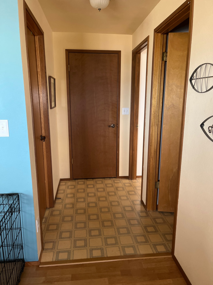 Long Hallway With Many Doors