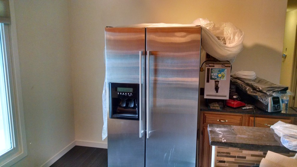 Need help to fill space in Kitchen next to the refrigerator.