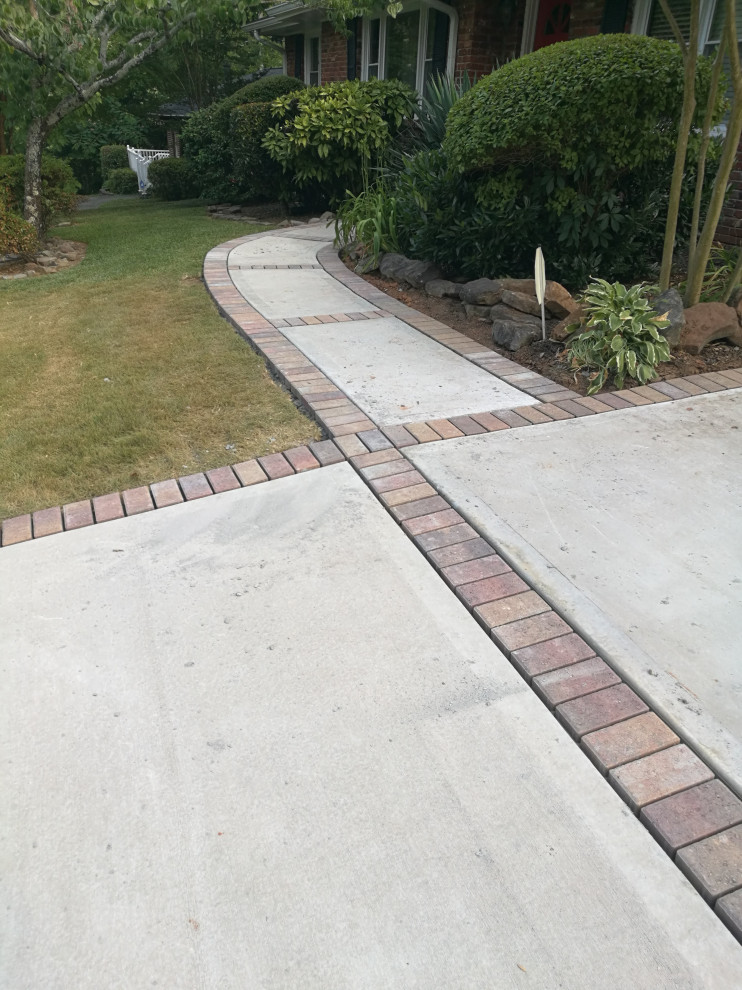 Driveway and sidewalk replacement with custom brick inlay - Atlanta ...