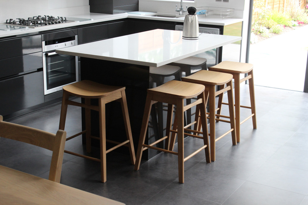 Sleek Modern Black Kitchen with Island by Kudos Interior Design ...