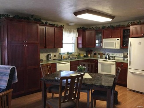 Kitchen and Dining Room with Connected Entryway
