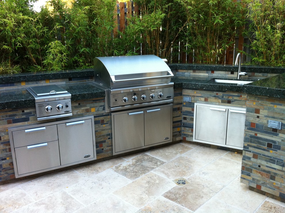 Patio with outdoor kitchen and water feature - Contemporary - Patio ...