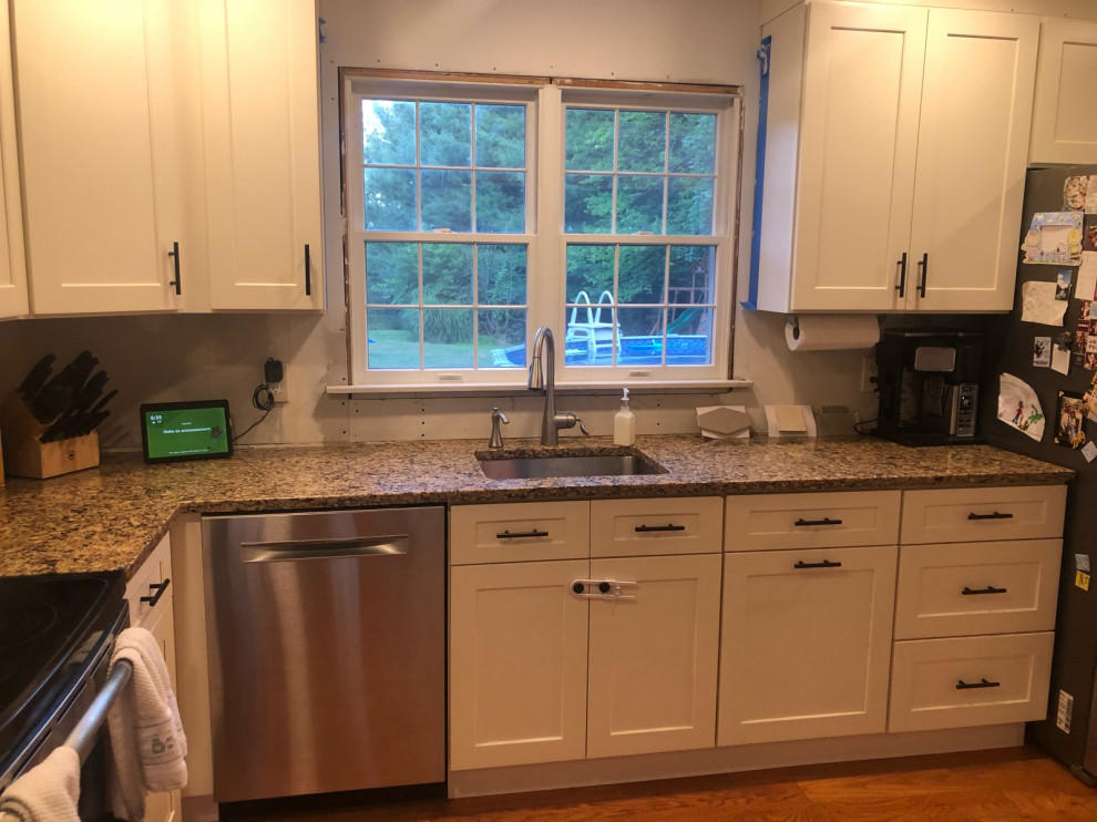 ideas for backsplash with busy brown countertops