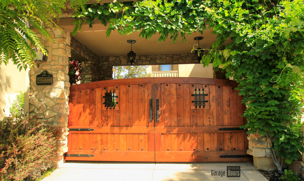 Tuscan style wooden driveway gate - Mediterranean - Exterior - San ...