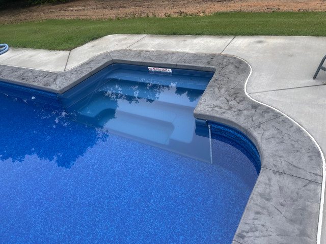 Polymer Vinyl Liner Pool with stamped/colored Concrete Cantilever Edge ...