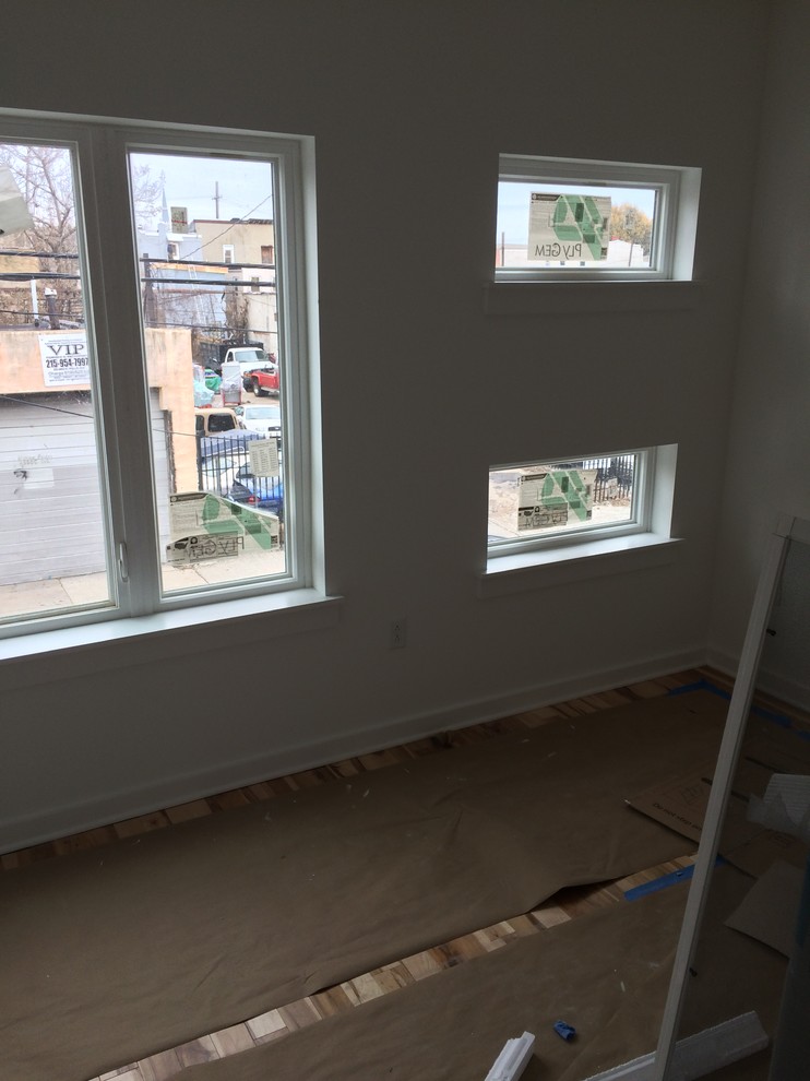 Two short windows next to a large window?