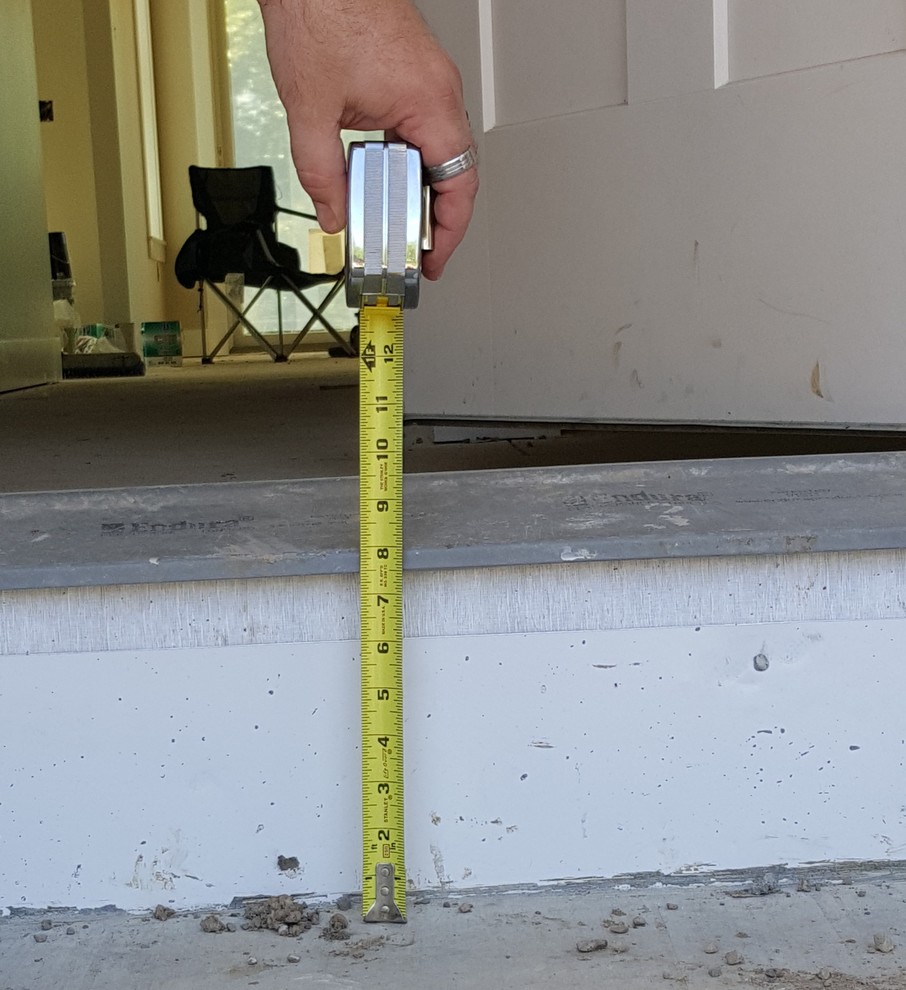 New Construction-Front entry step in to house too high-Not to code