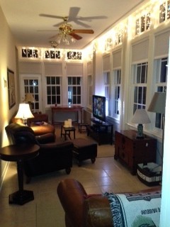 Long, narrow, room, with one wall of windows. Furniture placement?