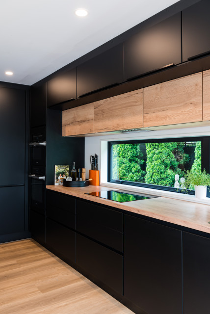 Stunning Black and Wood-Look entertainers kitchen - Contemporary ...