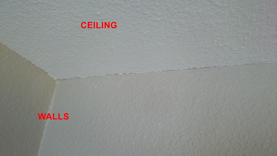 Painted wall color leaked into taped-up ceiling?