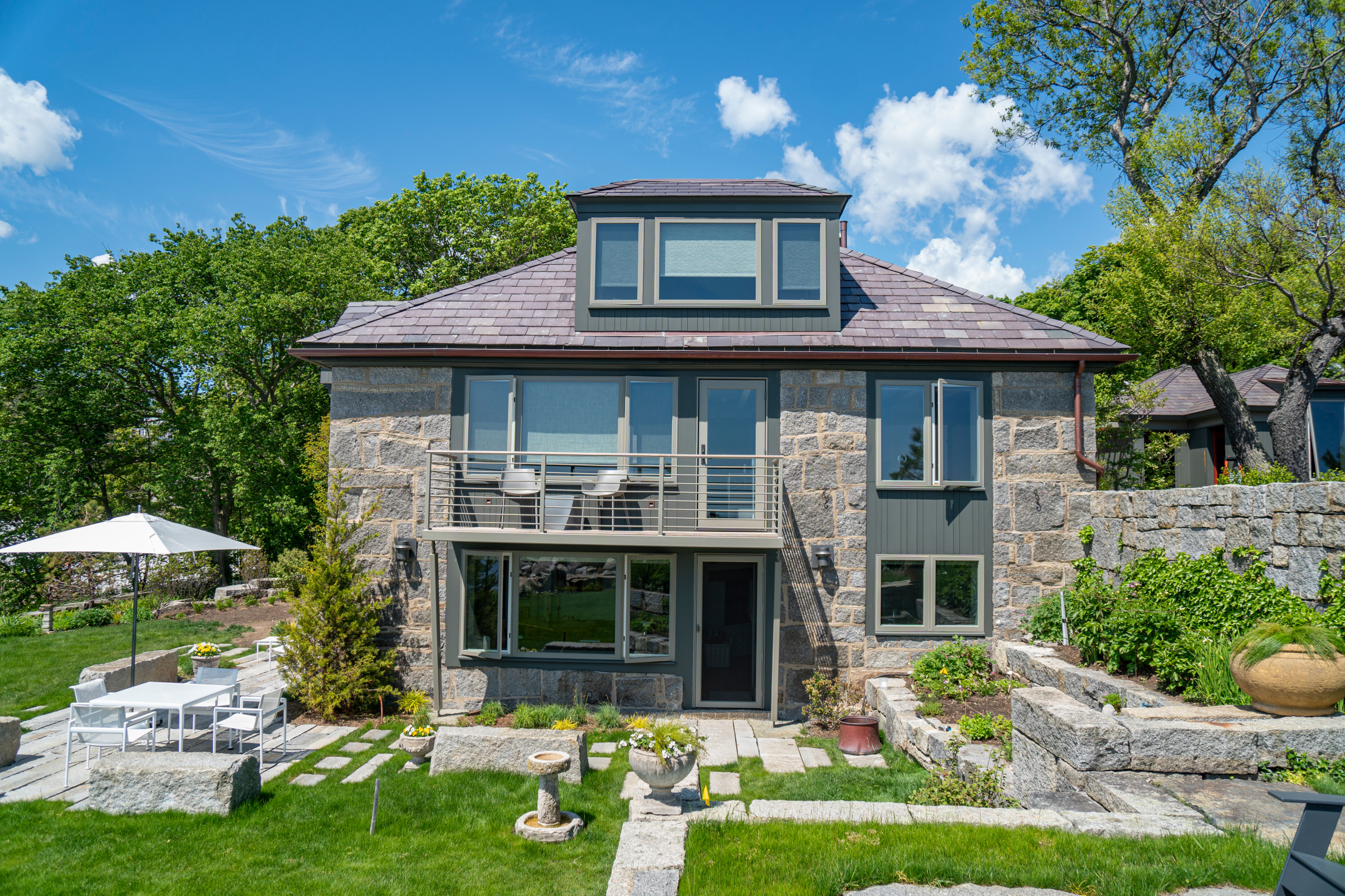 How to Make Your Stone House Feel at Home in the Landscape