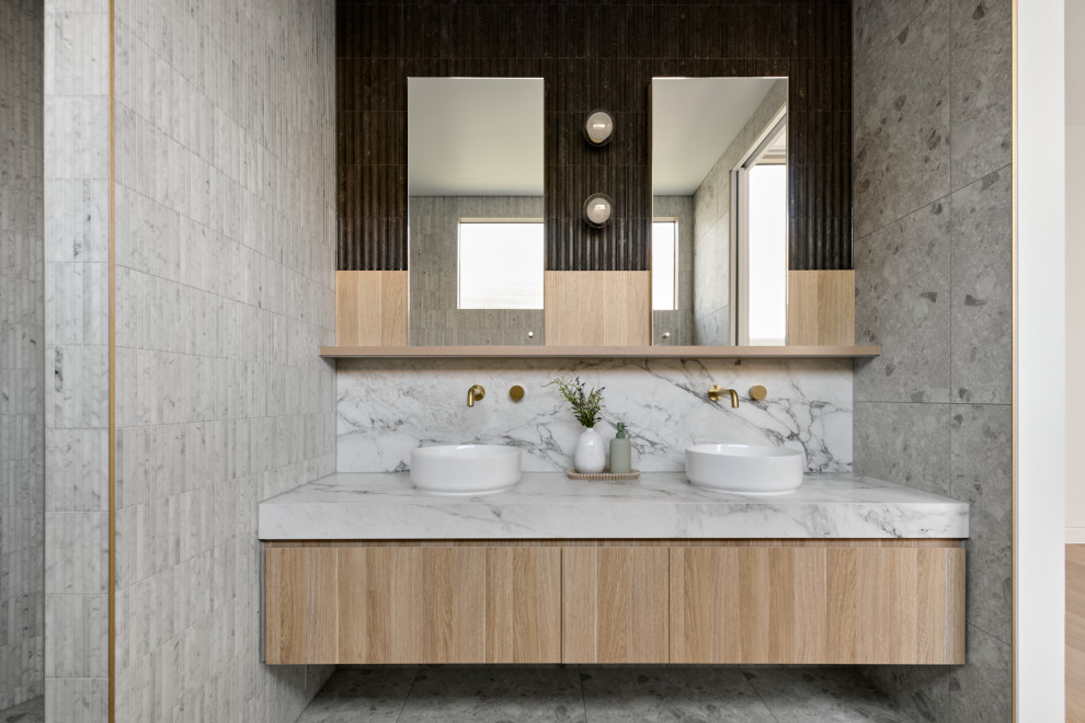 Havenwood House | Luxurious bathroom with natural stone - Contemporary ...