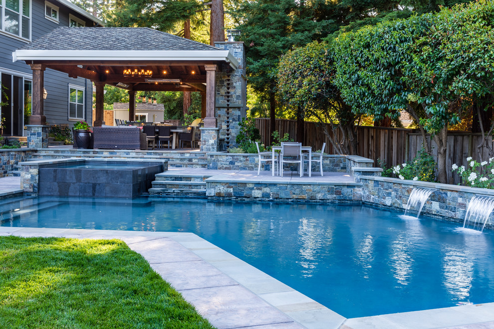 a Loggia with an Outdoor Kitchen and Living Room - Rustic - Pool - San ...