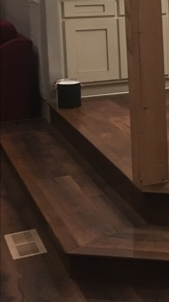 Sunken living room step riser flush with wall. How to install trim?