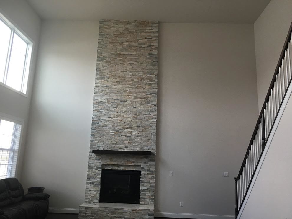 Beach walk ledge stone fireplace
