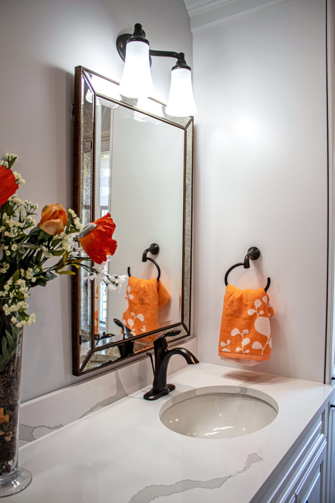 White Bathroom with Envi Quartz Countertops and Curved Tub with Mini ...