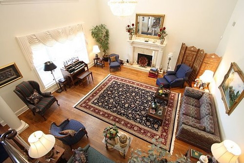 Two large windows in 20 foot ceiling living room