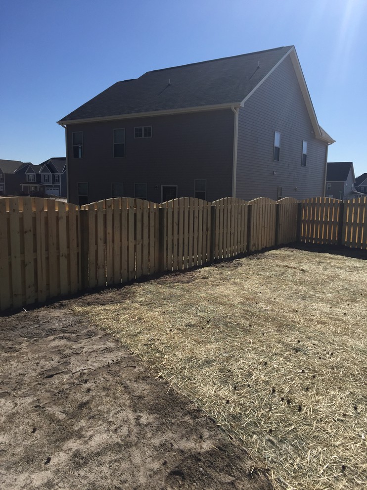 Arched shadow box fence - Raleigh - by Professional Fence Company | Houzz