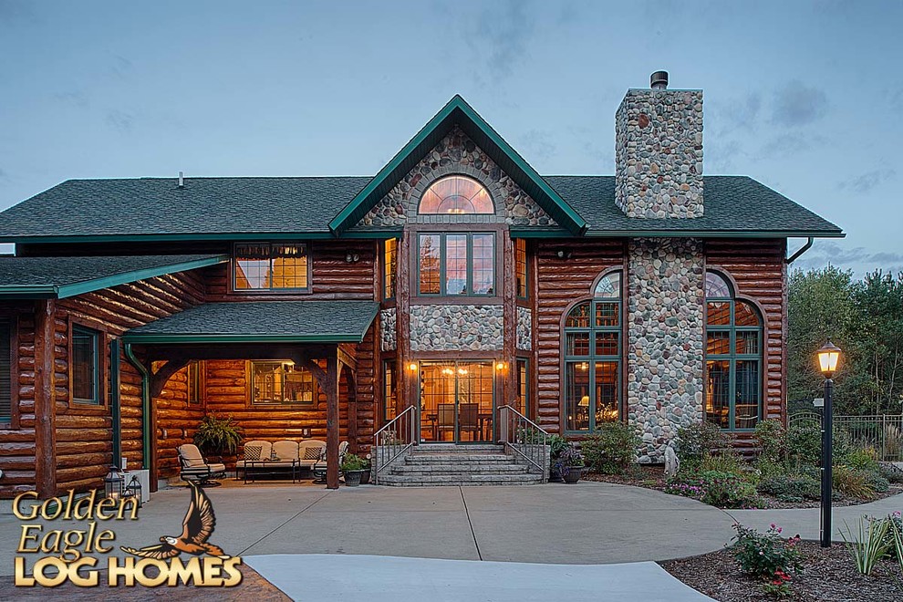 Two story log home with lots of glass Shenandoah model by Golden Eagle ...