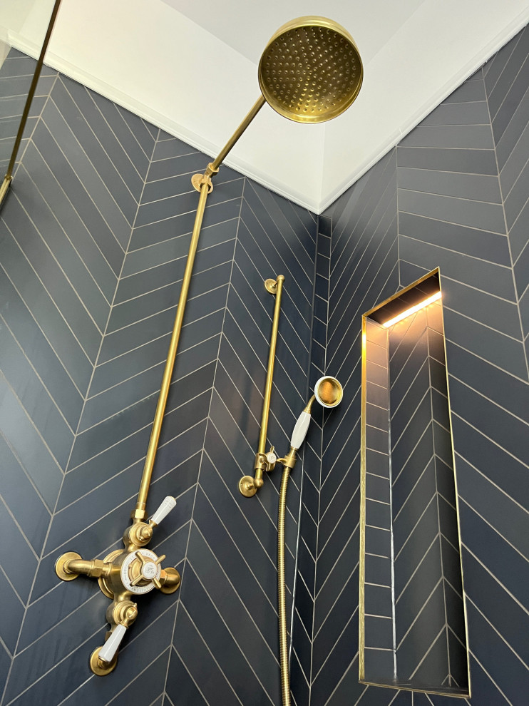 Modern Bathroom with Floral Wallpaper, Brass Fixtures & Blue Vanity ...