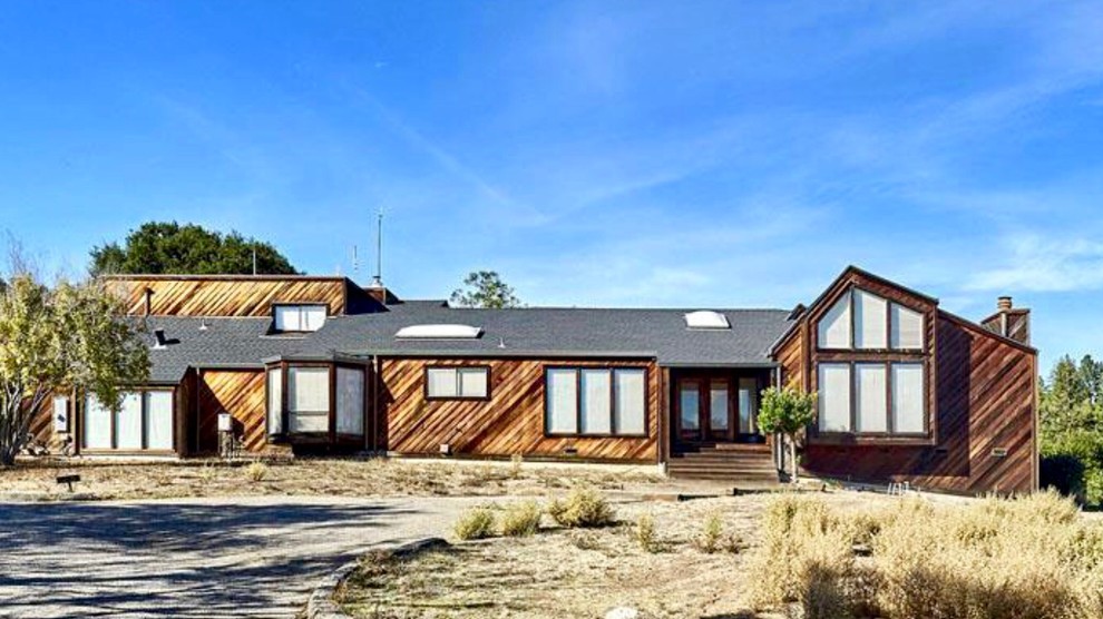 80s house with diagonal siding