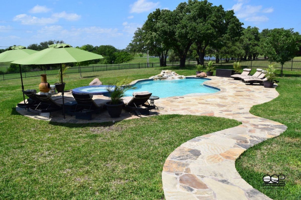 Freeform Pool with Overflow Spa and Rock Waterfall - Austin - by Ocean ...